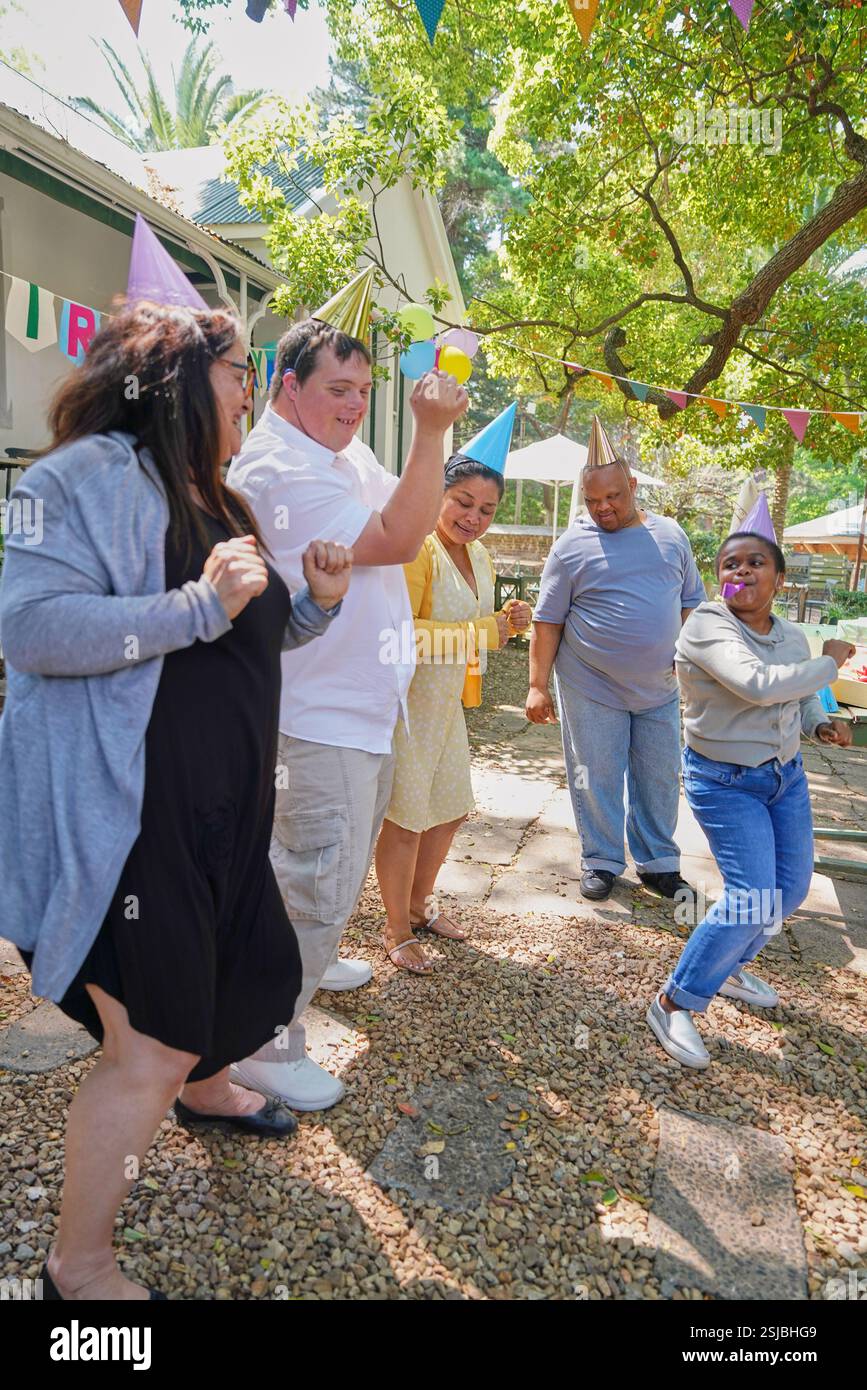 Disabled friends celebrating birthday Stock Photo - Alamy