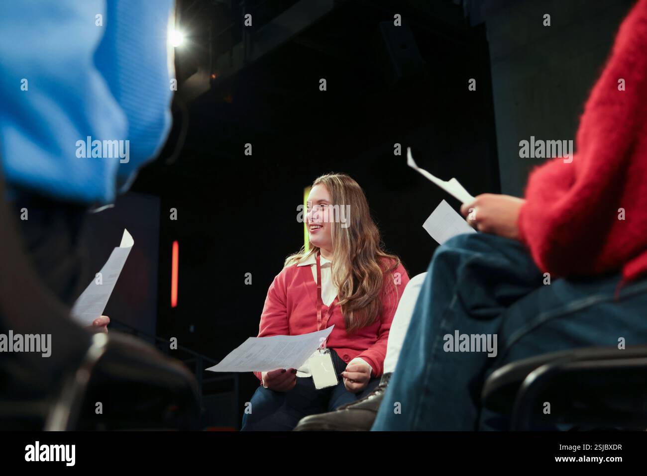 Friends talking during rehearsal Stock Photo - Alamy