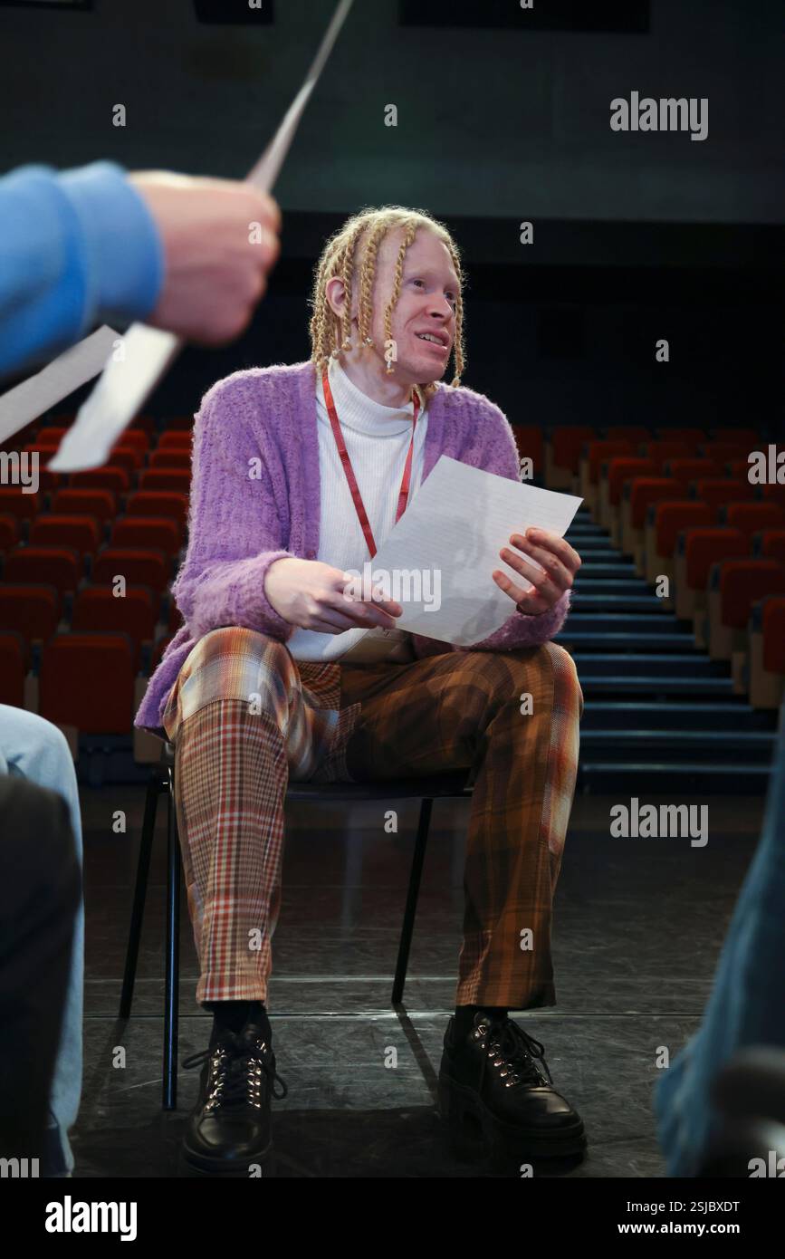 Man reading text during hi-res stock photography and images - Alamy