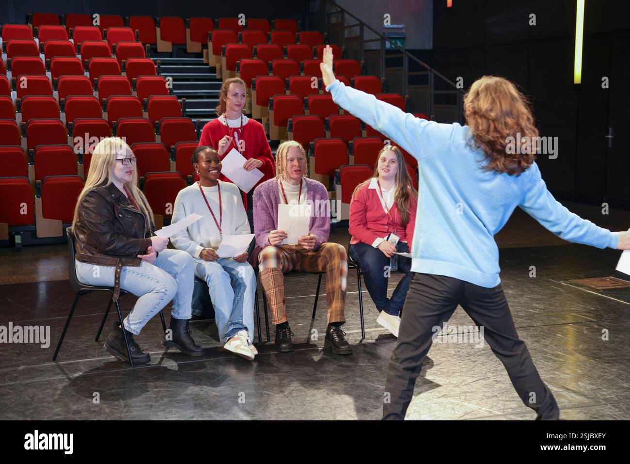 Group of disabled people on stage during rehearsal Stock Photo - Alamy