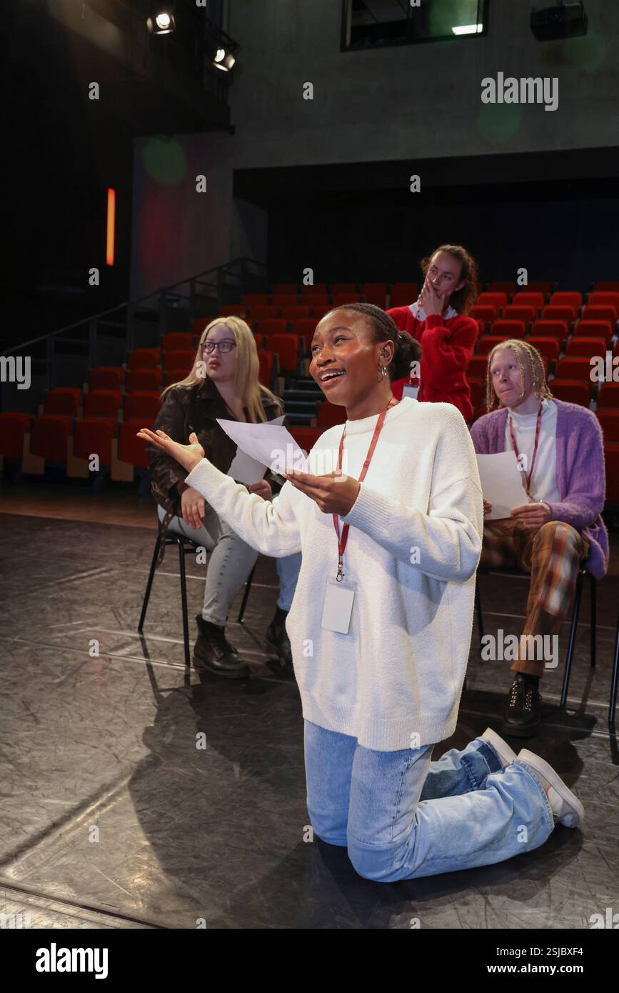 Group of disabled people on stage during rehearsal Stock Photo - Alamy