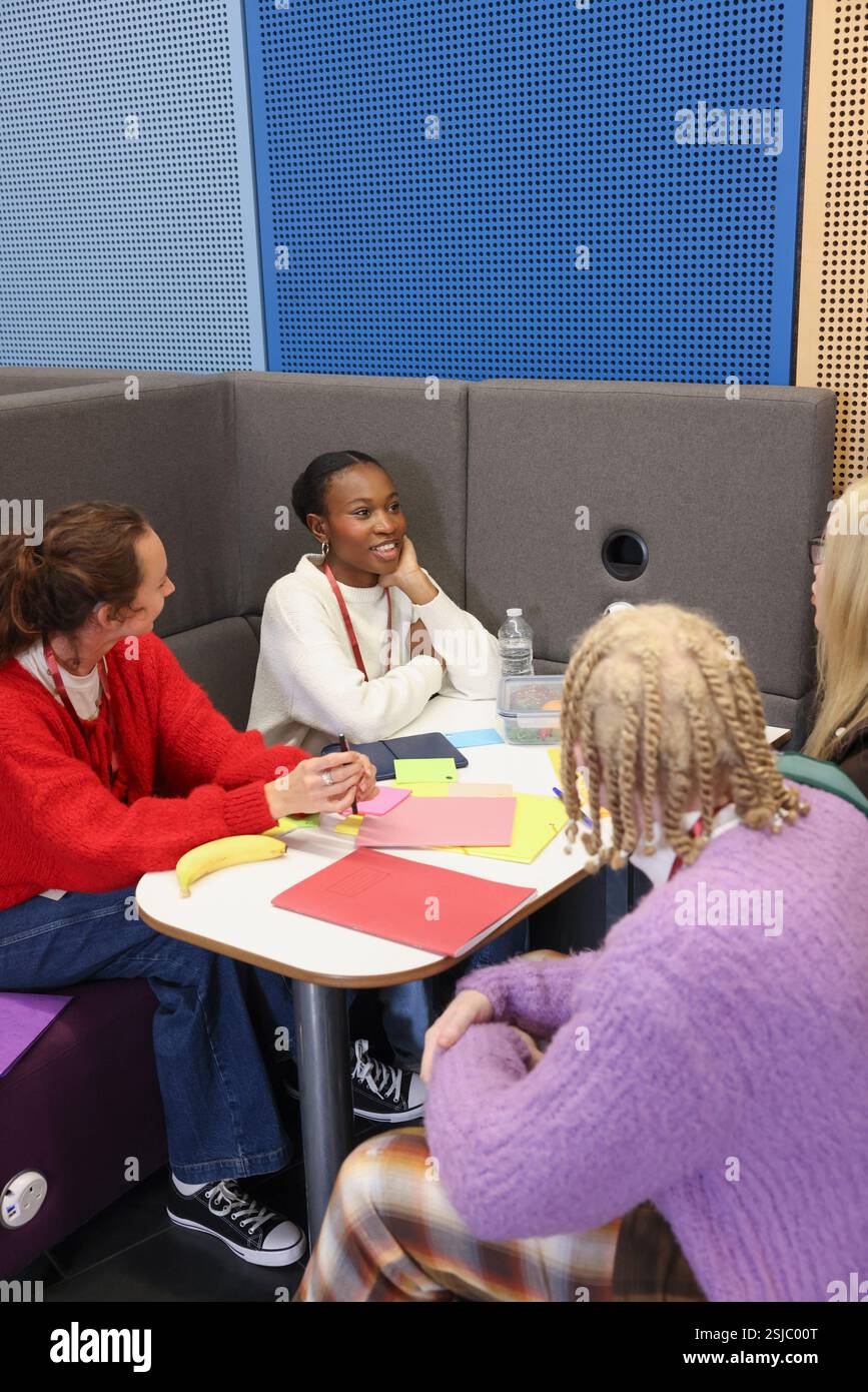 Disabled people sitting at tables Stock Photo - Alamy