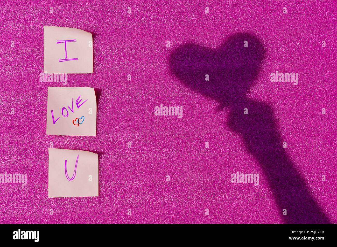 A heartfelt 'I Love You' message on a sticky note, set against a dreamy ...