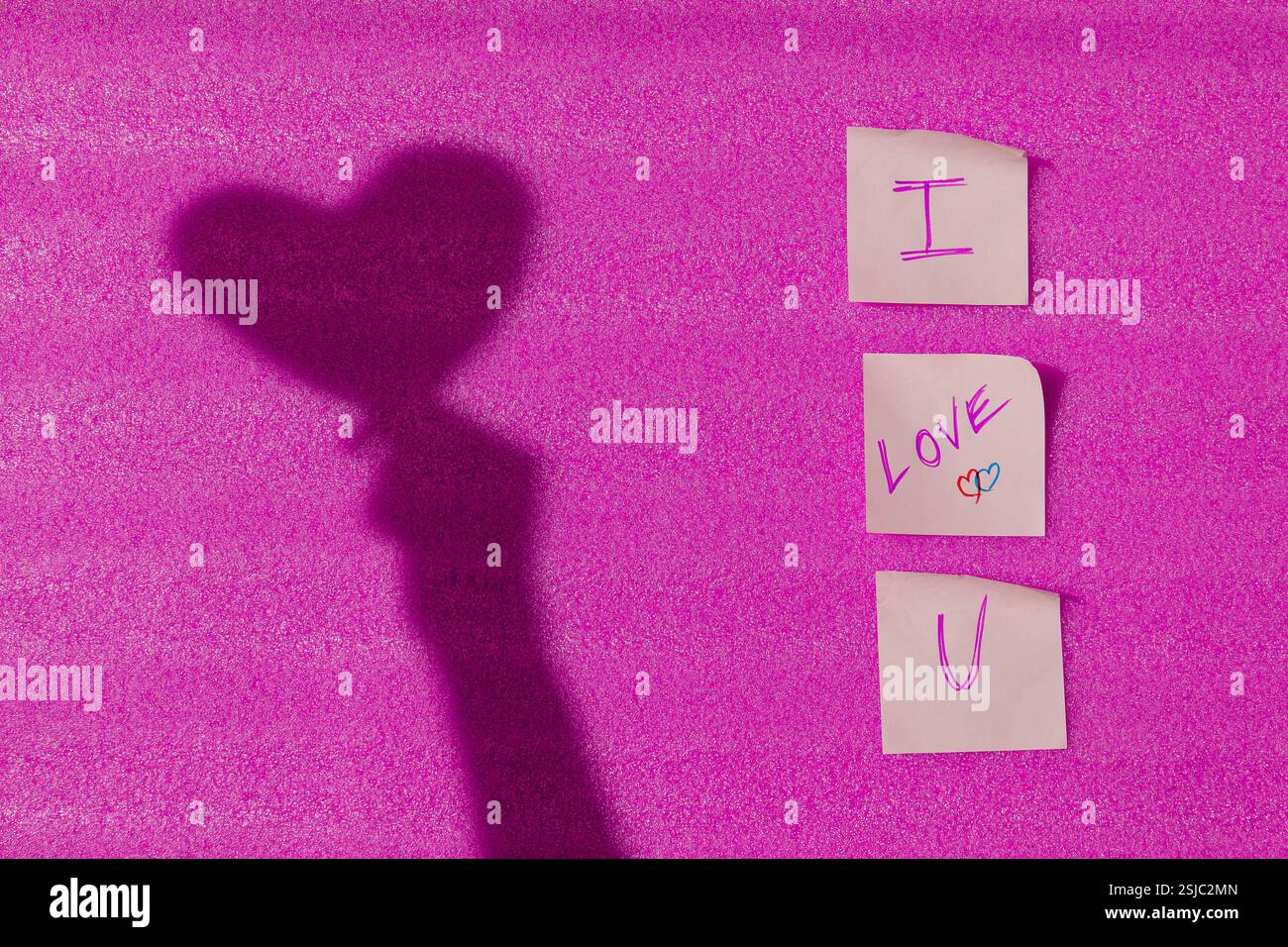 'I Love You' handwritten on a sticky note, a sweet expression of love ...