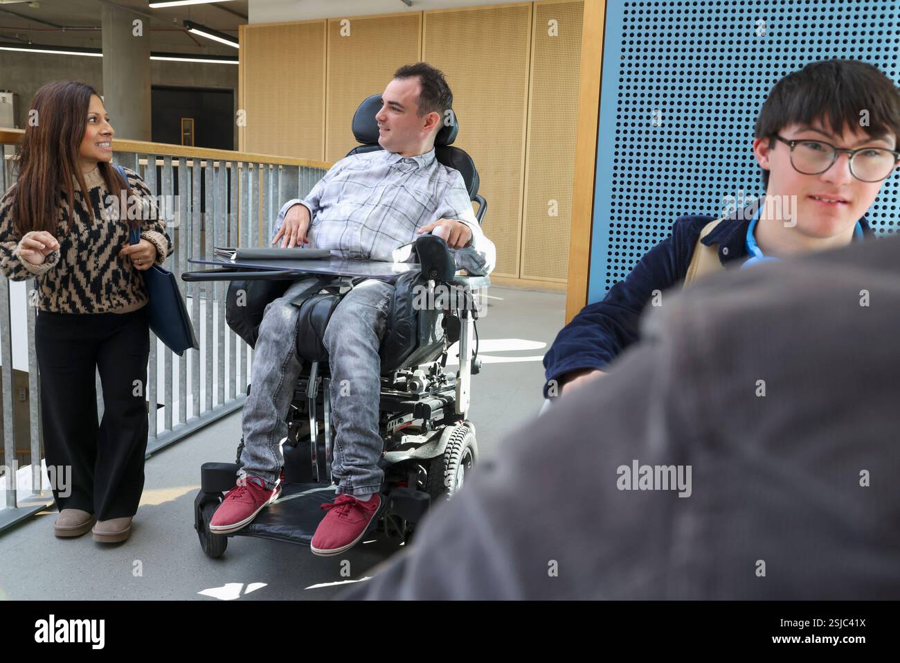 Disabled coworkers in office Stock Photo - Alamy