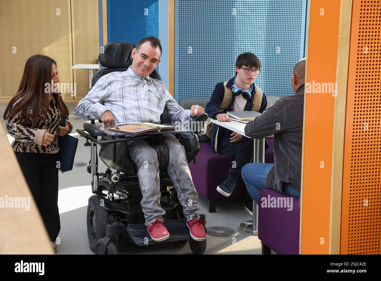 Smiling disabled people in office Stock Photo - Alamy