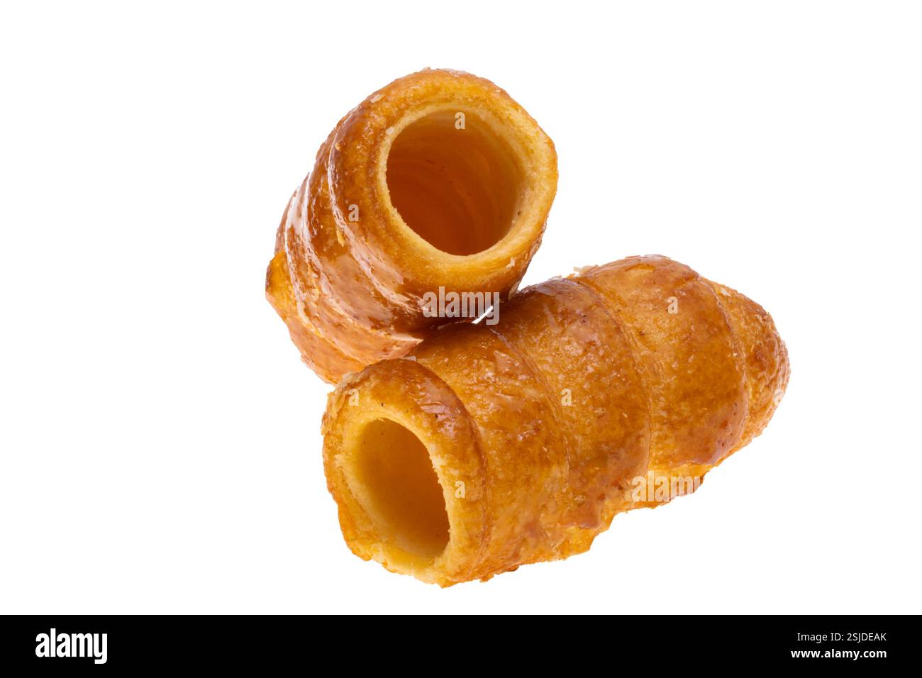puff pastry tubes isolated on white background Stock Photo - Alamy