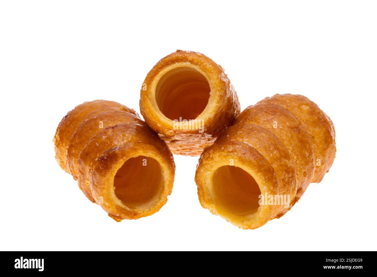 puff pastry tubes isolated on white background Stock Photo - Alamy