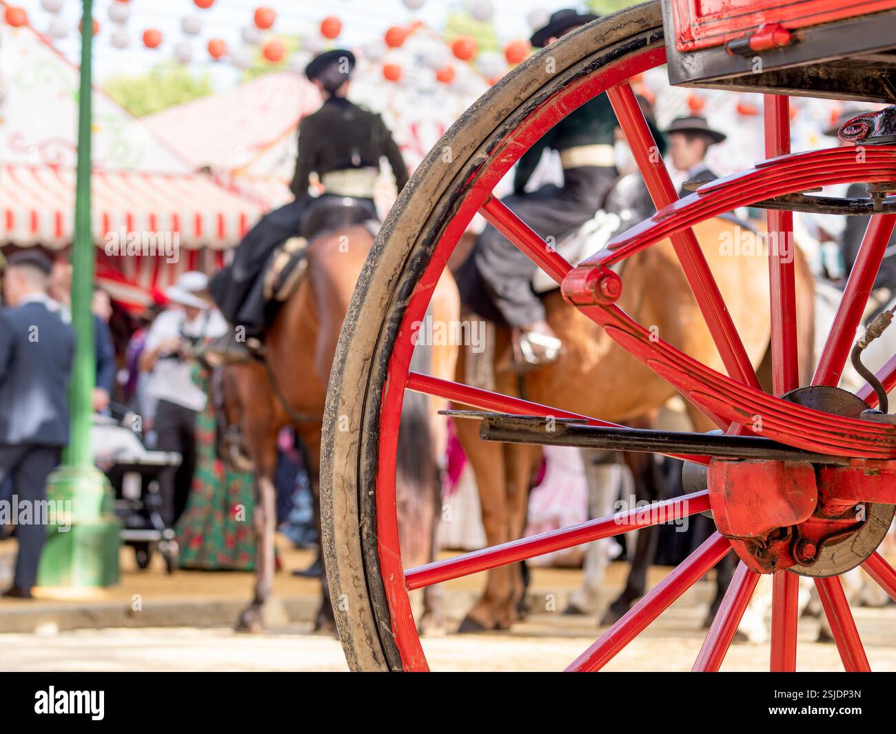 Traditional fair scene with carriage wheel Stock Photo - Alamy