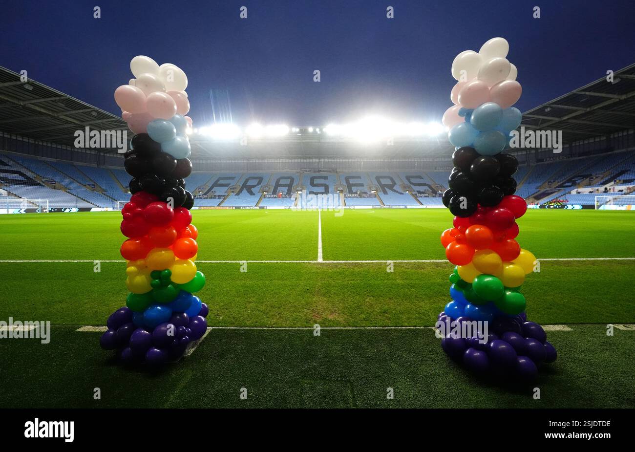 Multi-coloured balloons decorate the side of the pitch ahead of the Sky ...