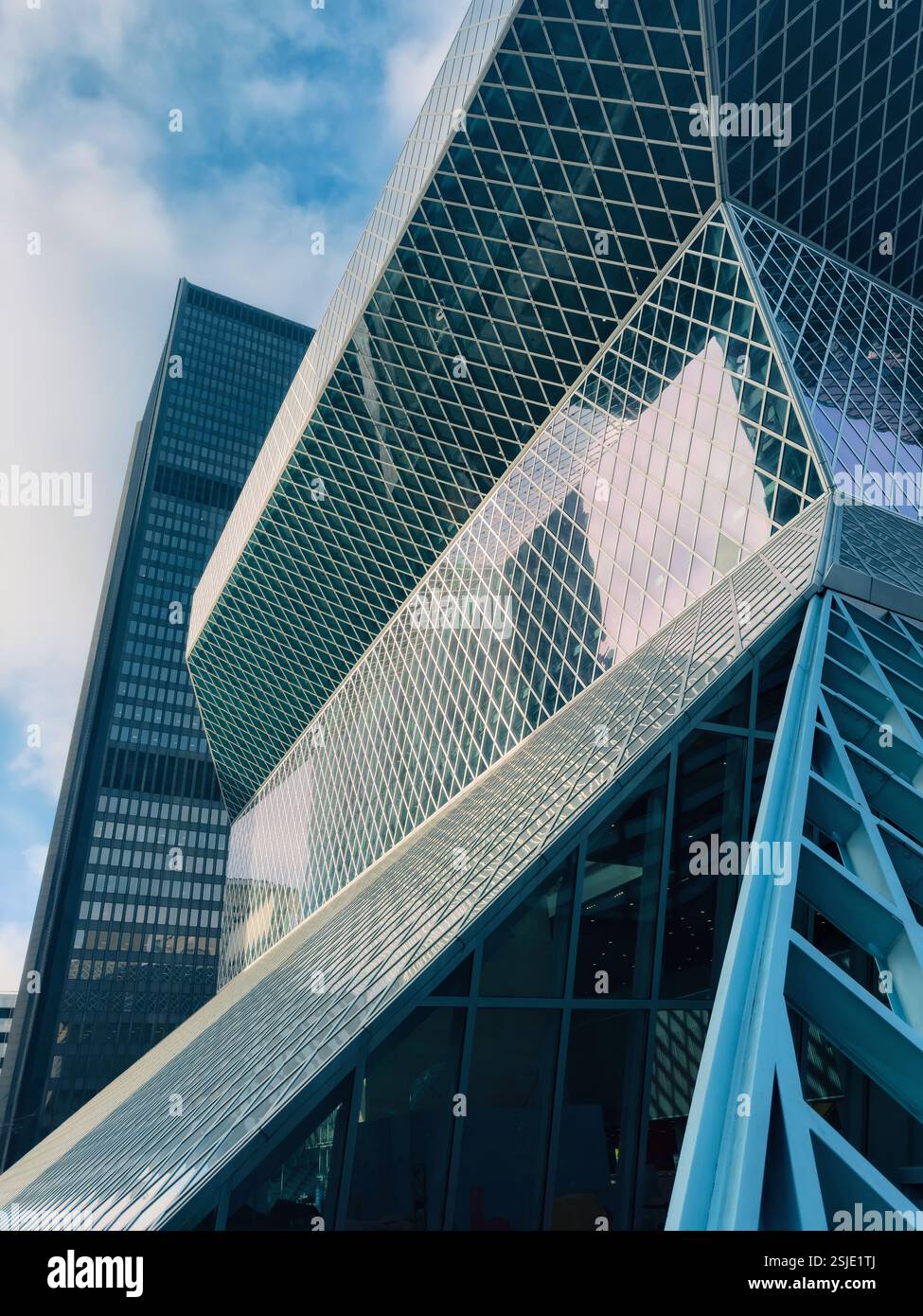 The image showcases a Seattle modern glass building with a unique ...