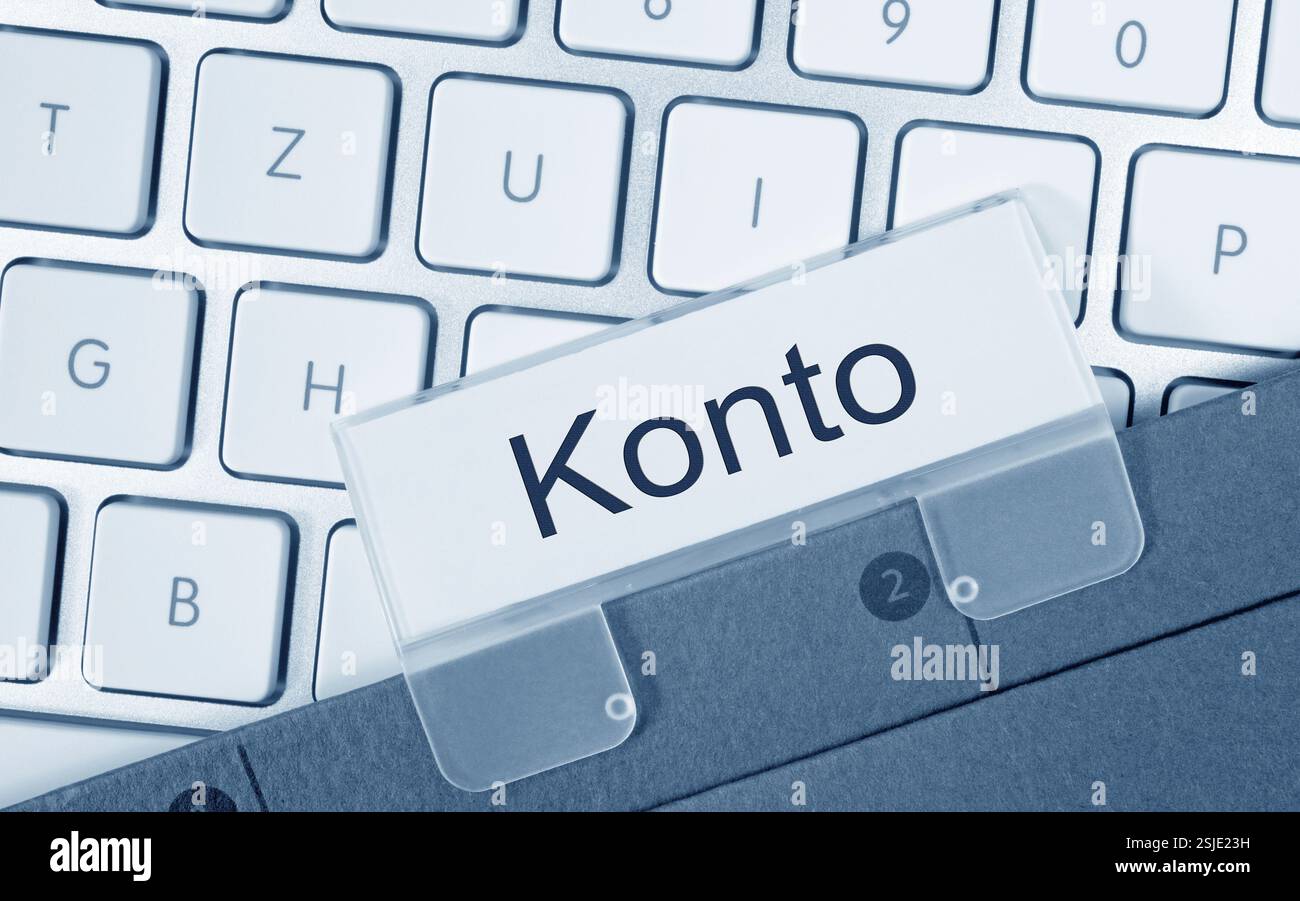 Account - Folder on computer keyboard Stock Photo - Alamy