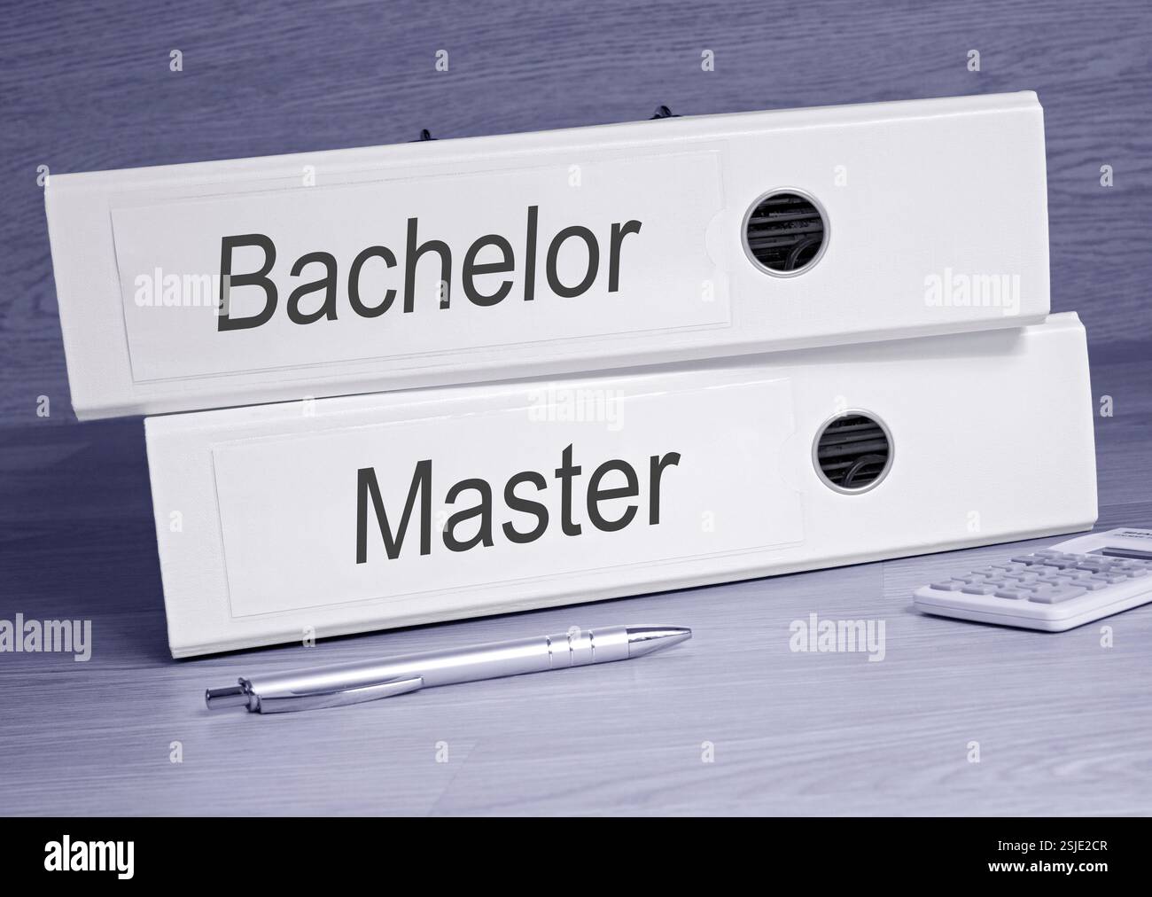 Bachelor and Master folders in the office Stock Photo - Alamy