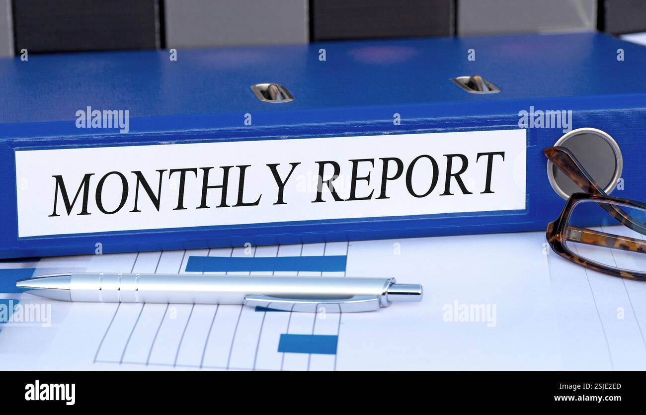 Monthly Report - Monthly report folder in the office Stock Photo - Alamy