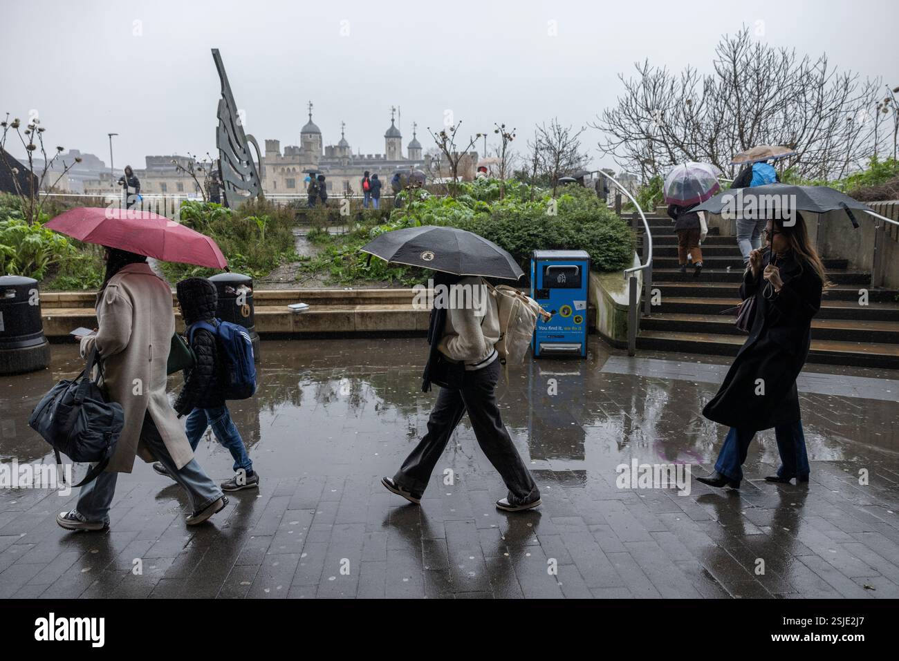 London tourists go about their day whilst sightseeing in Tower Hill ...