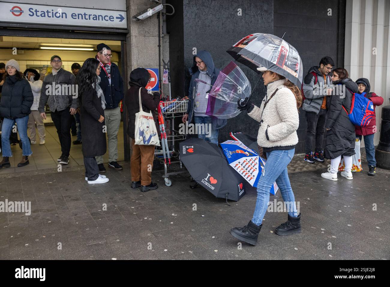 London tourists go about their day whilst sightseeing in Tower Hill area of central London ...