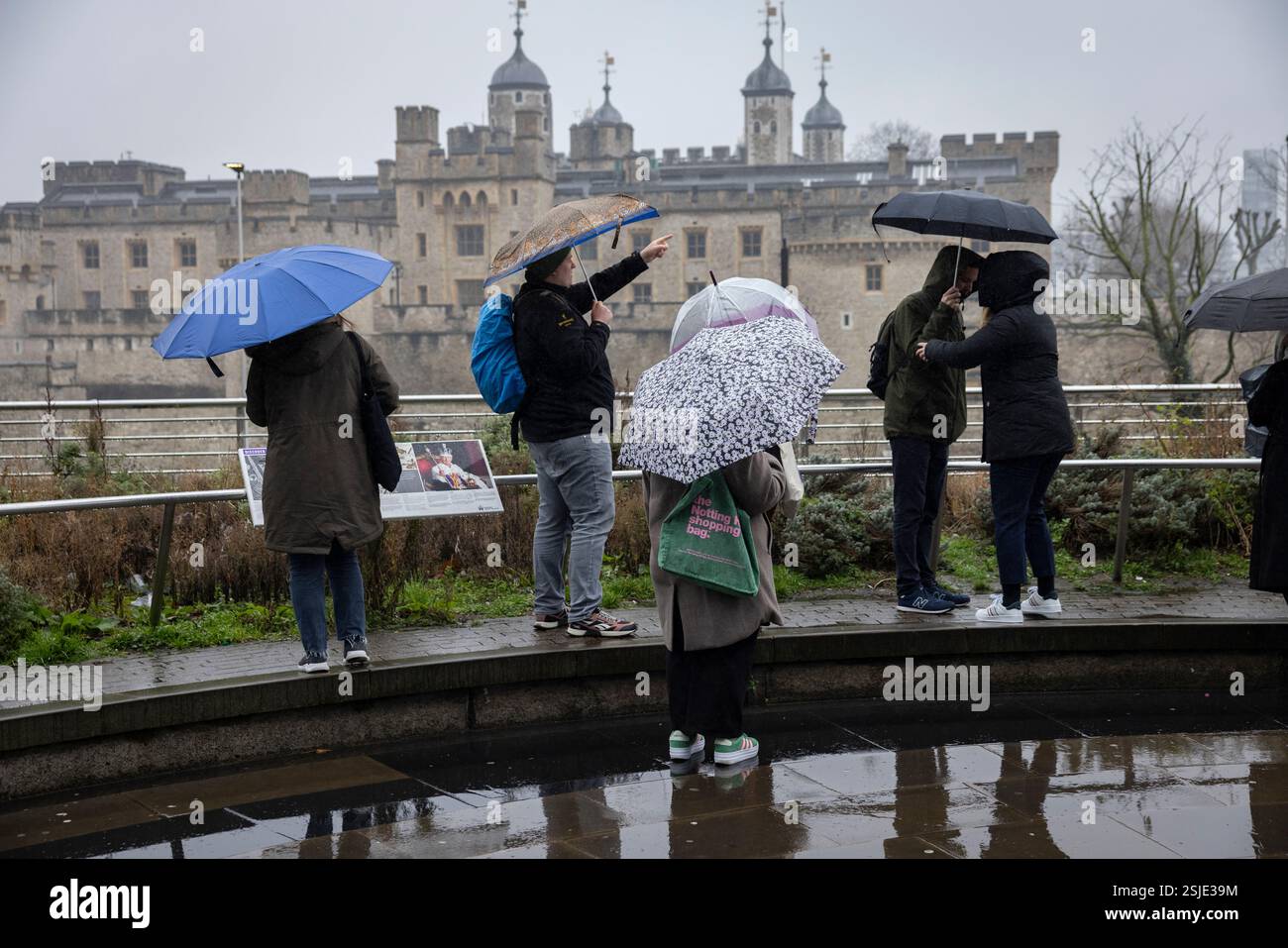 London tourists go about their day whilst sightseeing in Tower Hill ...