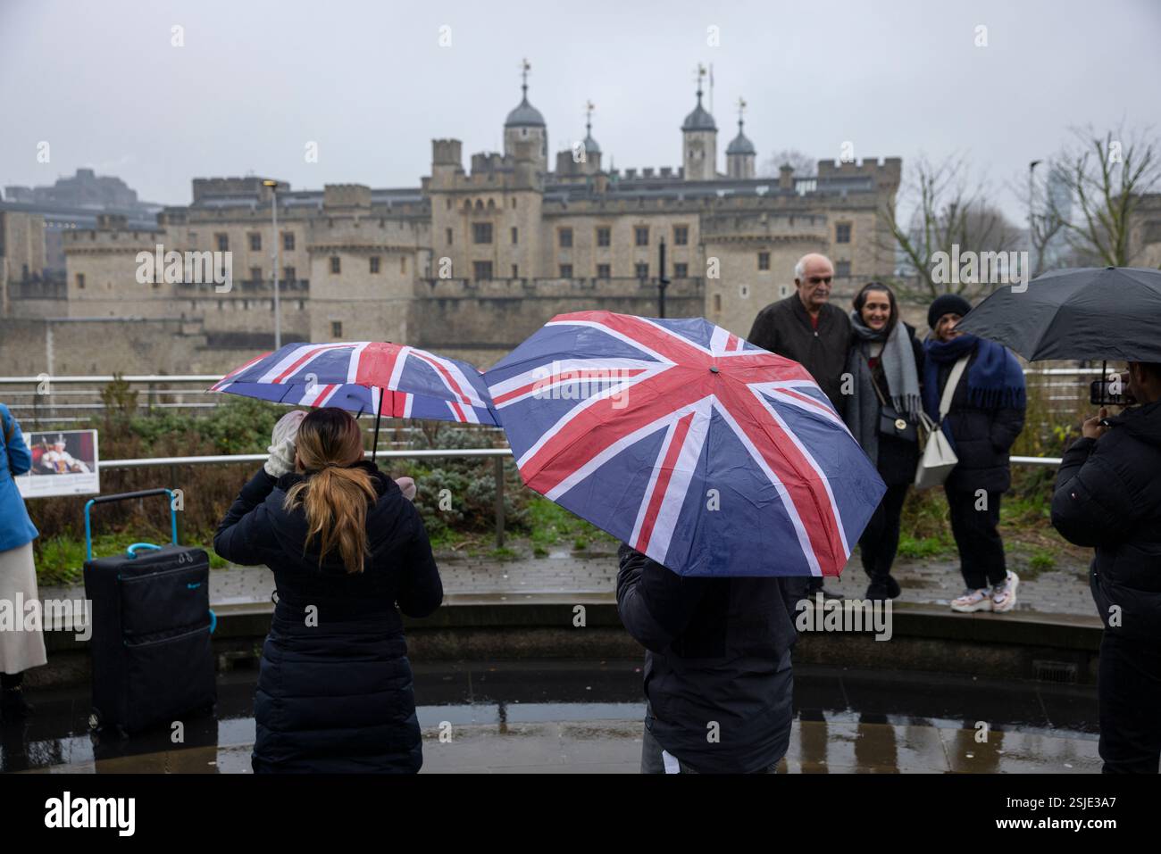 London tourists go about their day whilst sightseeing in Tower Hill ...