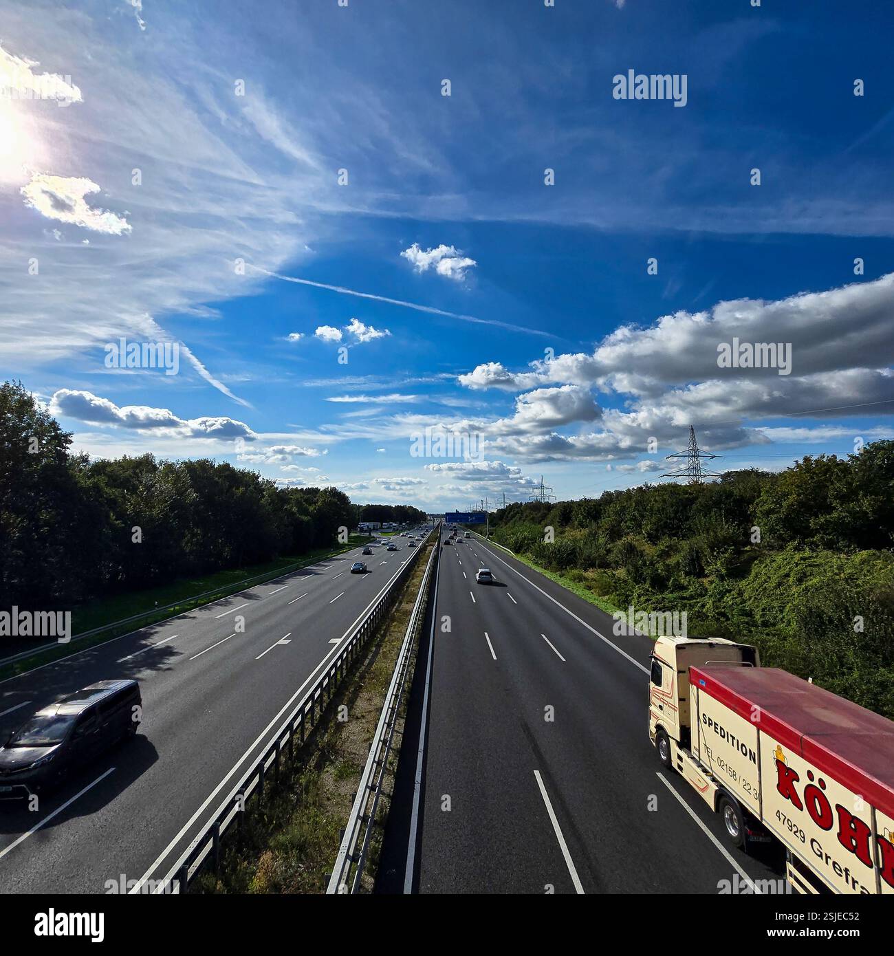 A stunning and picturesque view of a busy highway filled with trucks ...