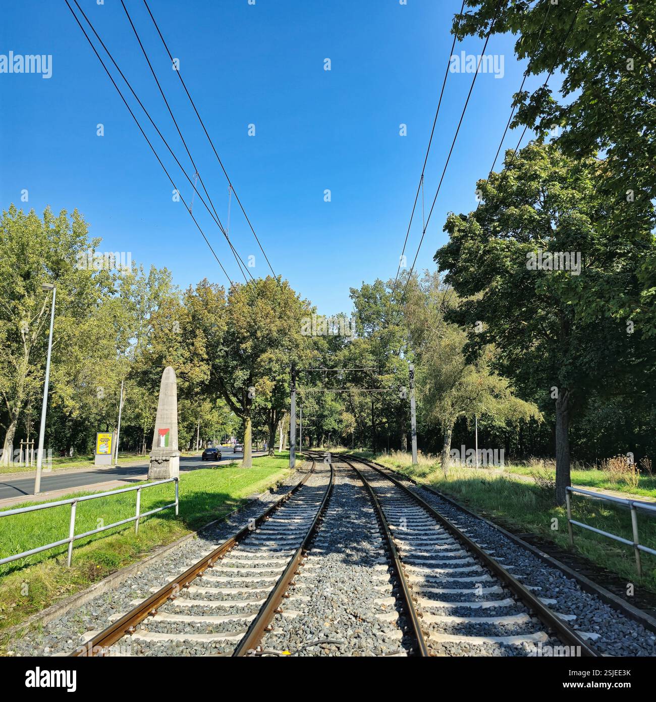 The breathtaking landscape features railway tracks beautifully framed ...