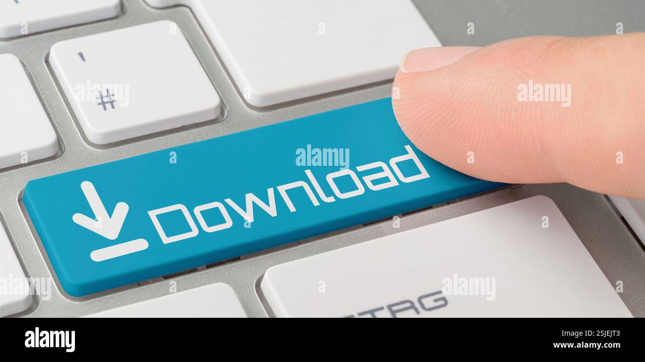 Keyboard with blue key - Download Stock Photo - Alamy