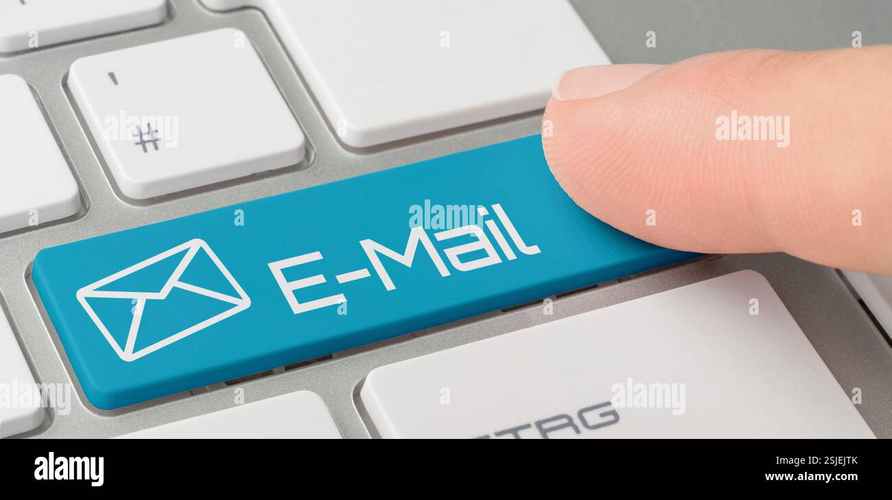 Keyboard with blue button - e-mail Stock Photo - Alamy