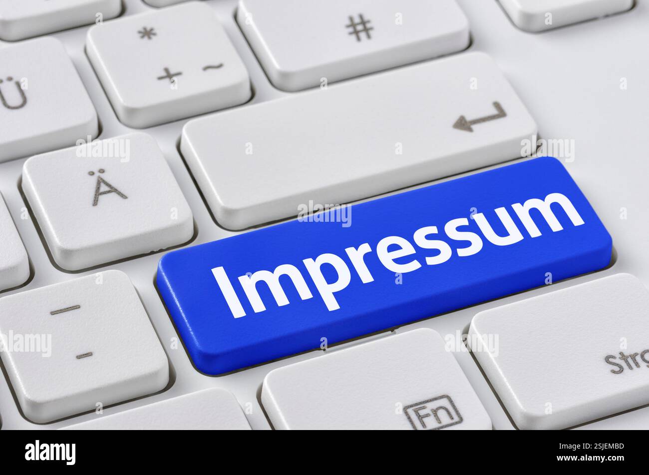 Keyboard with colored key - Imprint Stock Photo - Alamy