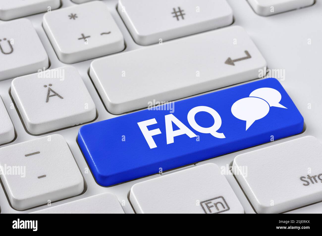 Keyboard with colored key - FAQ Stock Photo - Alamy