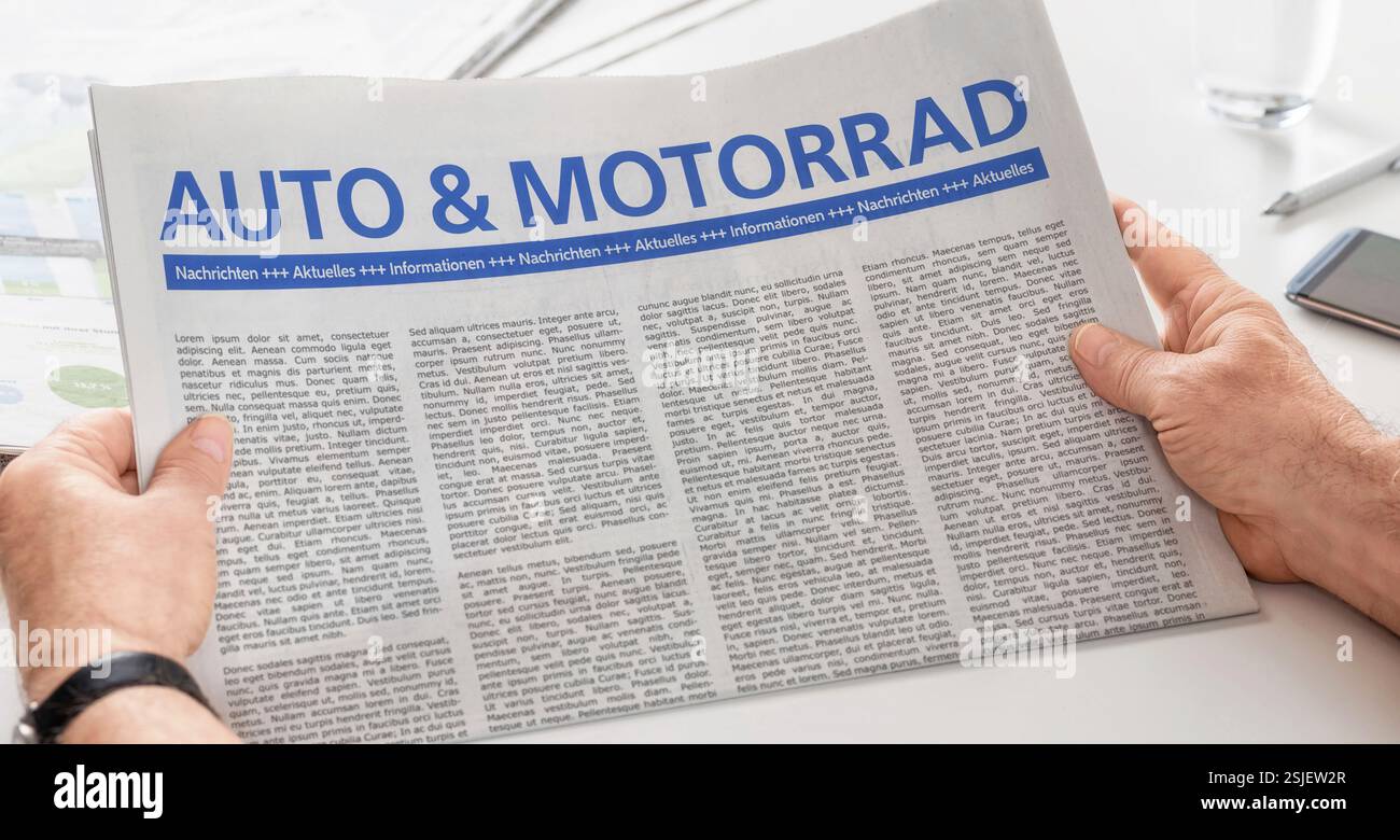 Man reading newspaper - car and motorcycle Stock Photo - Alamy