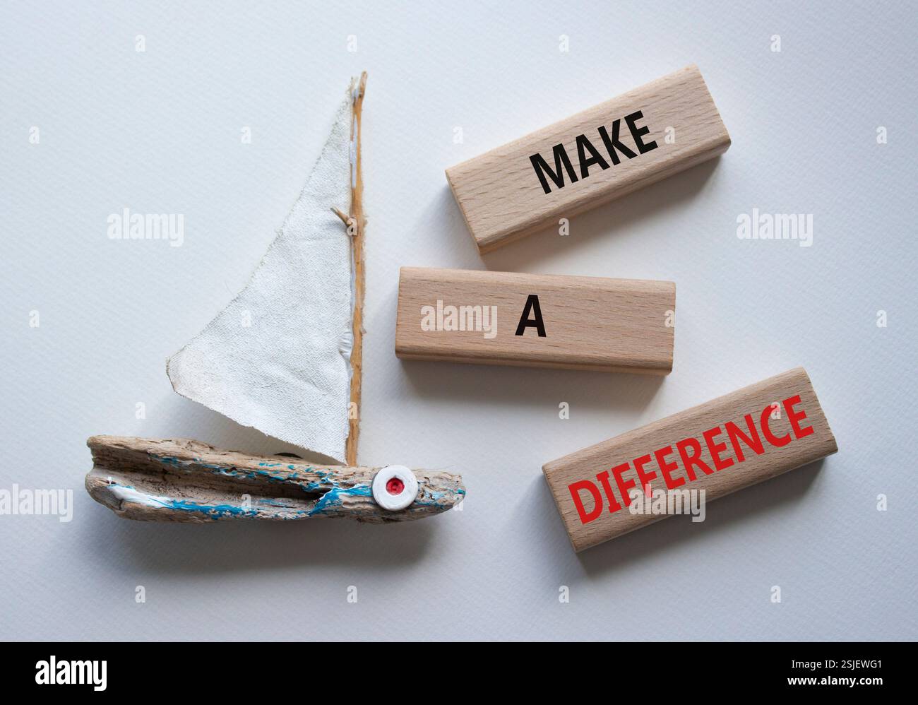Make a difference symbol. Concept words Make a difference on wooden ...