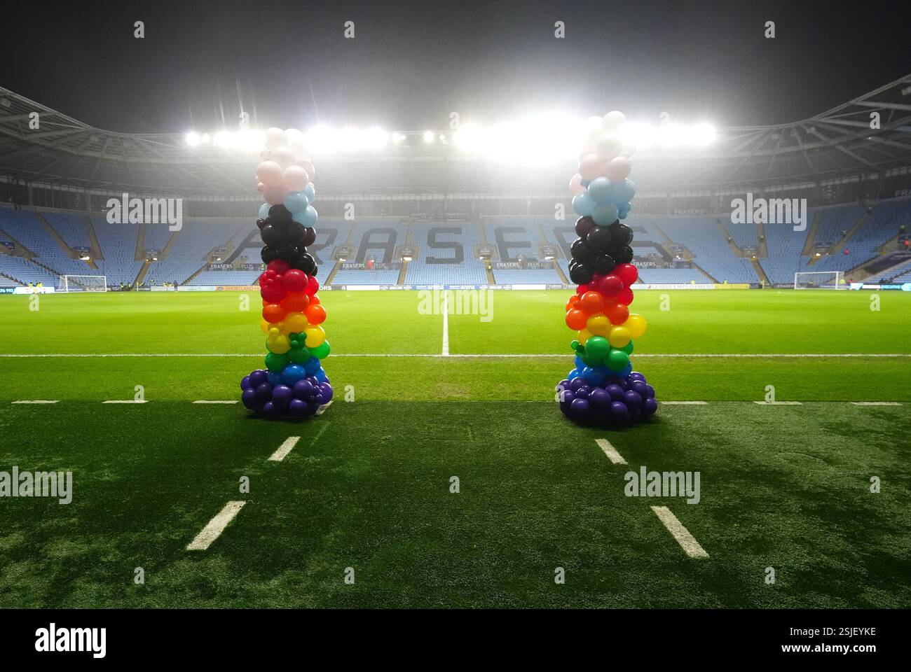 Multi-coloured balloons decorate the side of the pitch ahead of the Sky ...