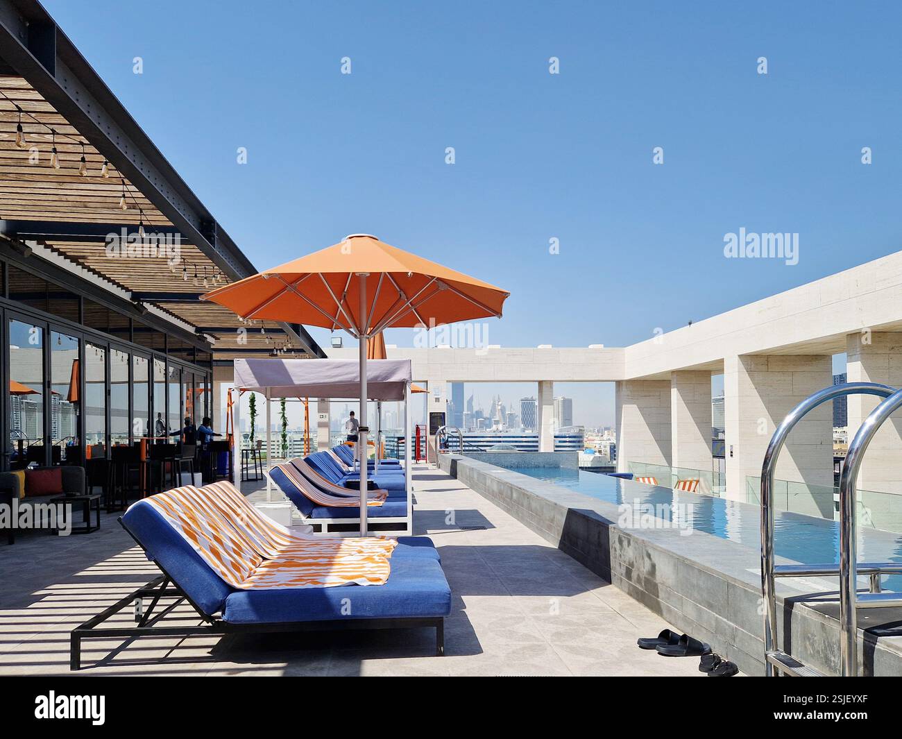 Deira, Dubai, the United Arab Emirates - 2024-05-26: A rooftop infinity ...