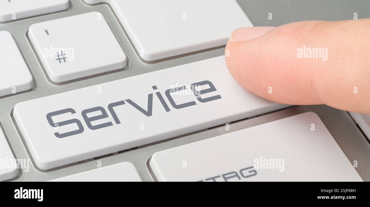 Keyboard with labeled key - Service Stock Photo - Alamy