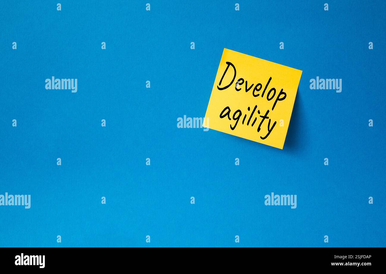 Develop agility symbol. Orange steaky note with concept words Develop ...