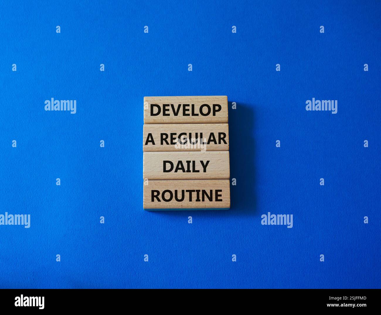 Develop a regular daily routine symbol. Concept words Develop a regular ...