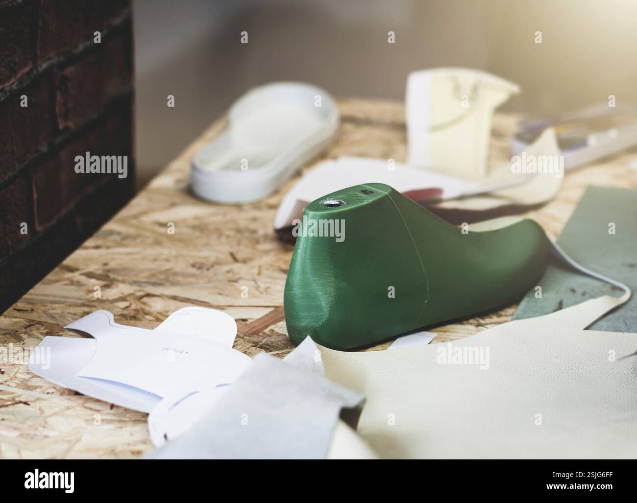Workplace of shoe designer, selective focus Stock Photo - Alamy