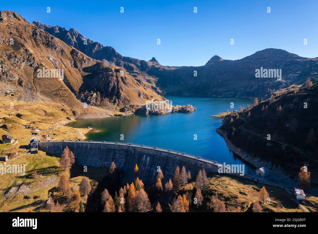 Aerial view of Laghi Gemelli, the dam and it's refuge. Branzi, Val ...