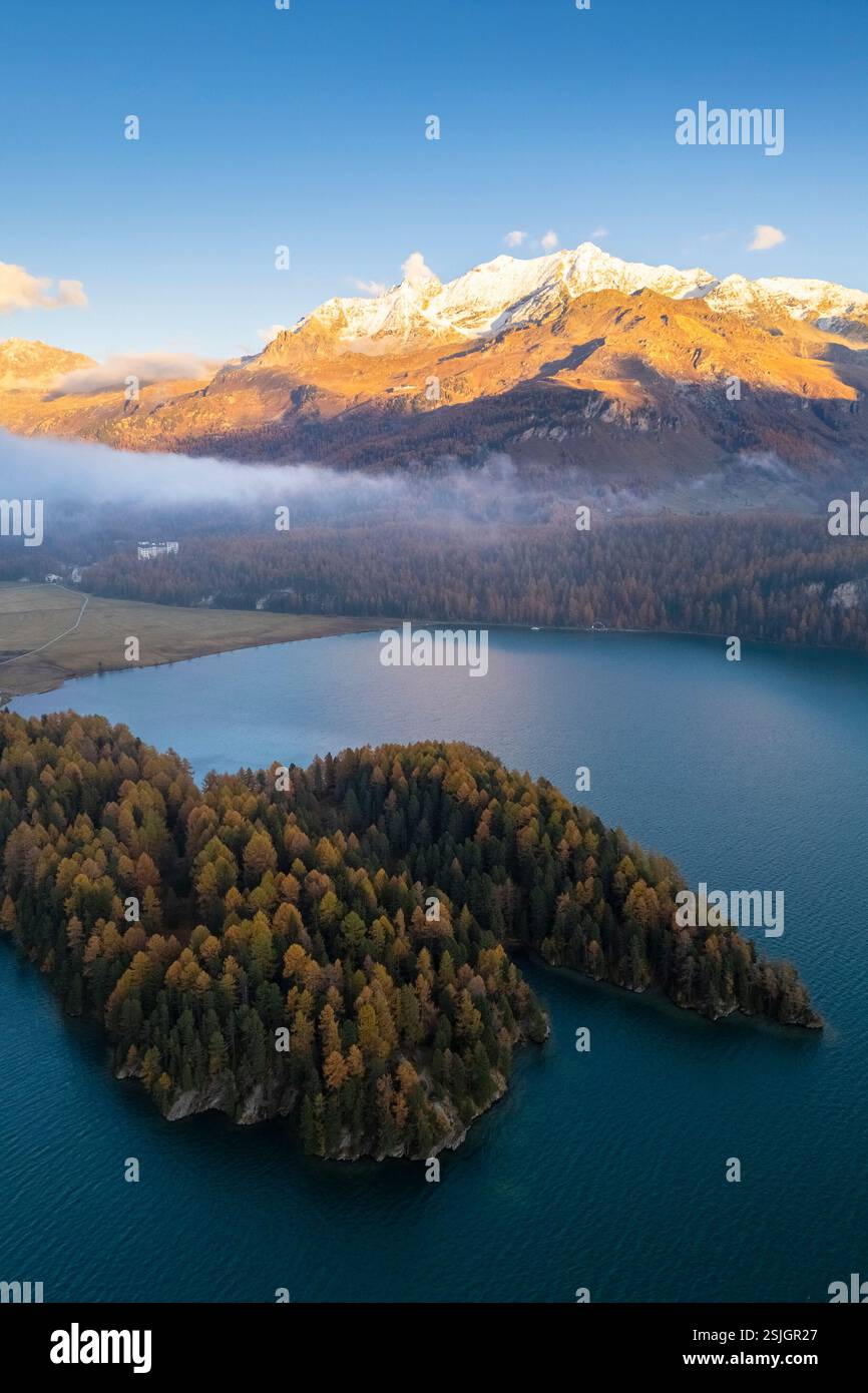 Aerial view of the Sils Lake and peninsula in autumn. Sils im Engadin ...