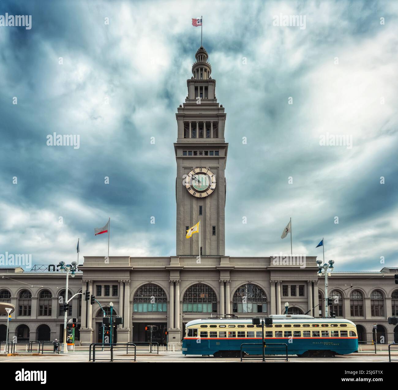 The majestic clock tower Of San Francisco Ferry Building with a tall ...