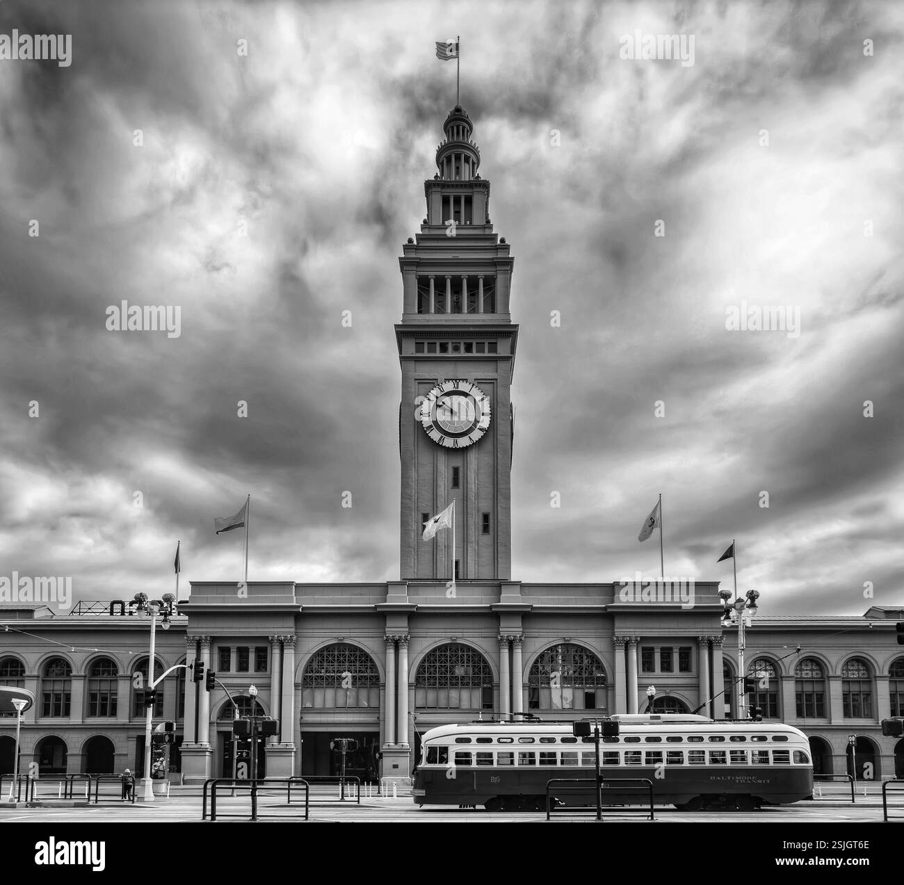 The majestic clock tower Of San Francisco Ferry Building with a tall ...