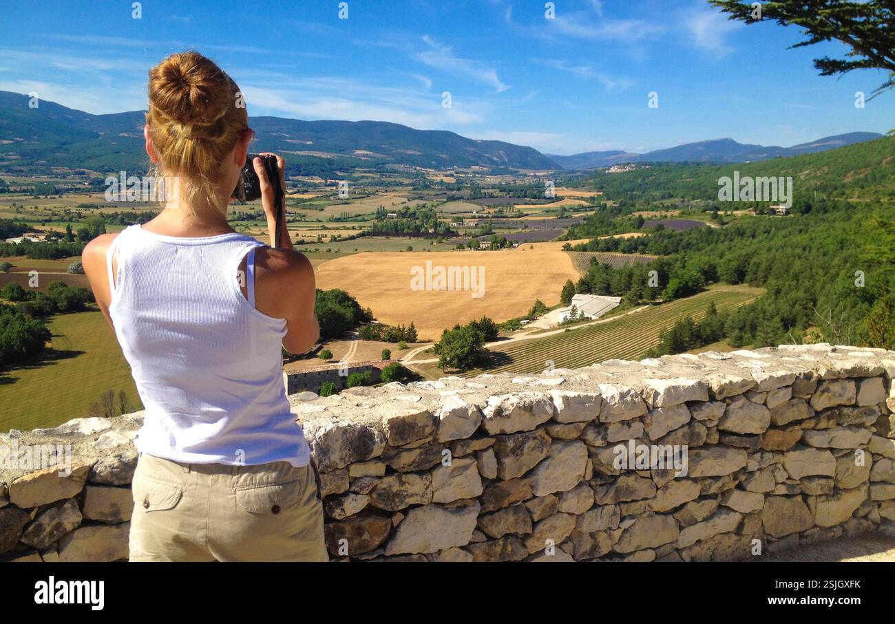 Girl takes pictures of the landscape of Provence, France Stock Photo ...