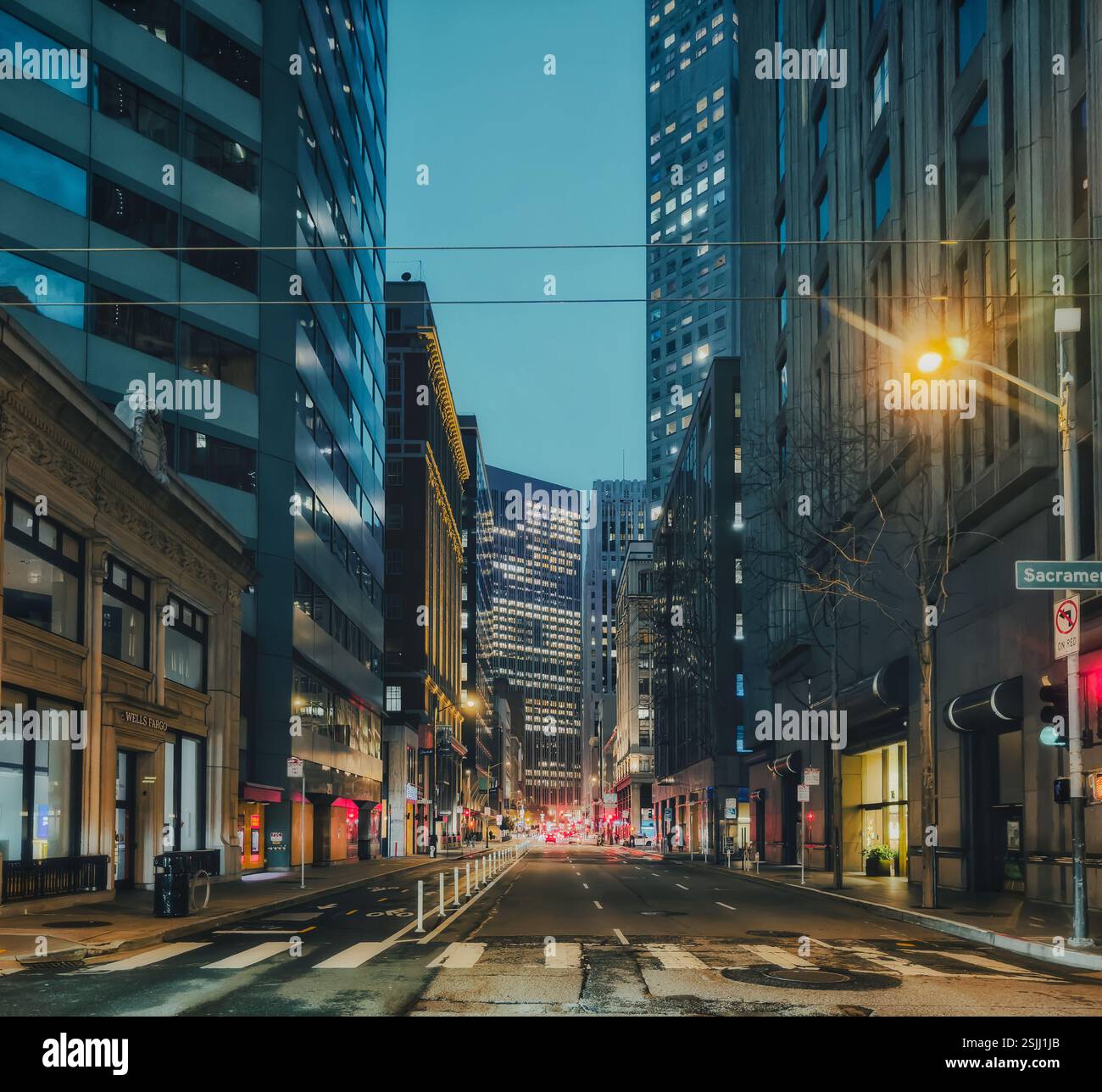 The image captures a bustling San Francisco street at night ...
