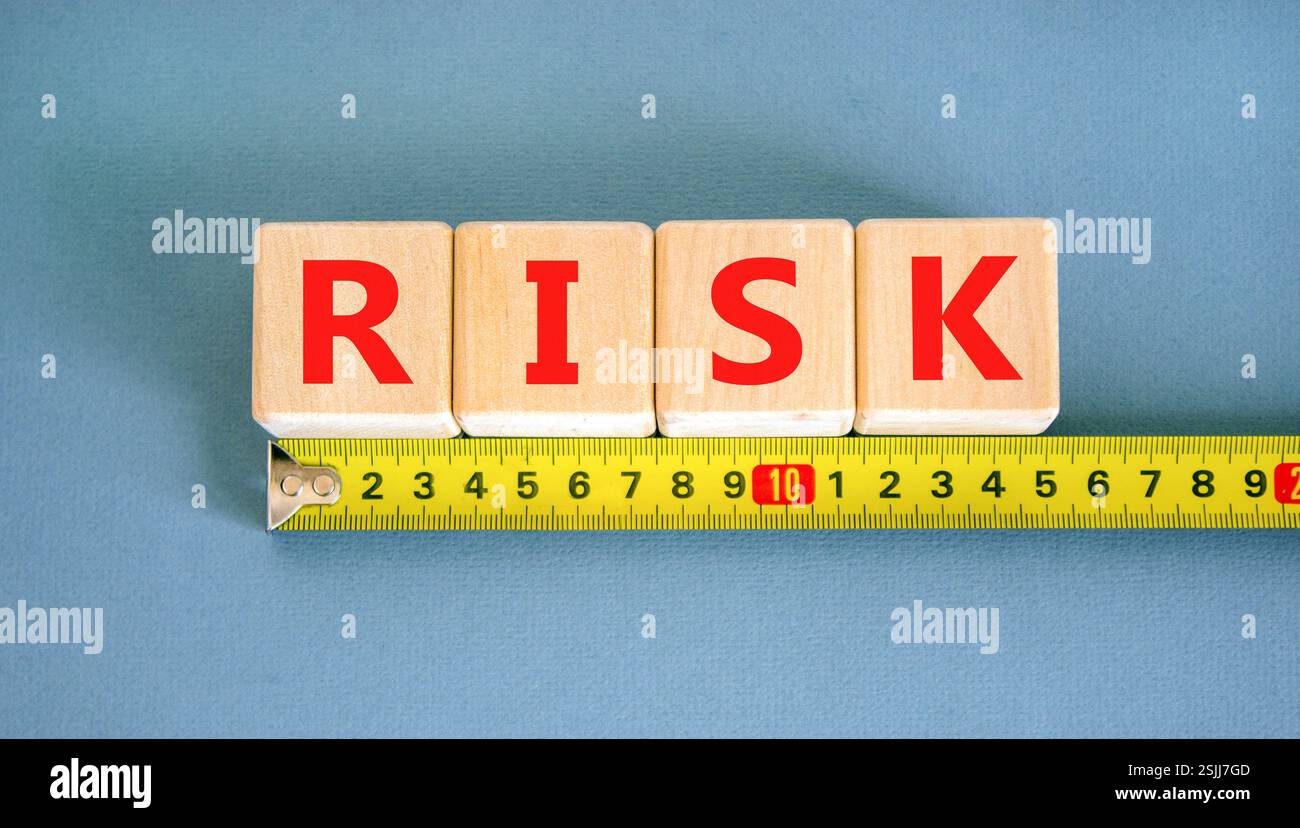 Risk symbol. Concept word Risk on beautiful wooden blocks. Beautiful ...