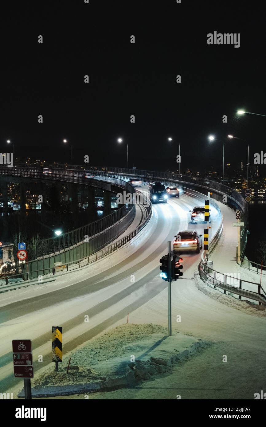 Cars driving over bridge in Tromso, Norway Stock Photo - Alamy
