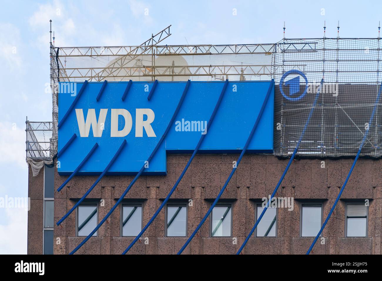 Facade with the logo of the German television station WDR ...