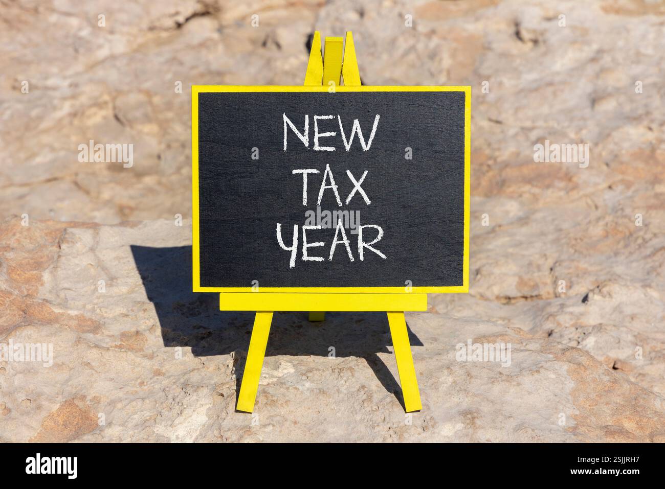 New tax year symbol. Concept words New tax year on beautiful black ...