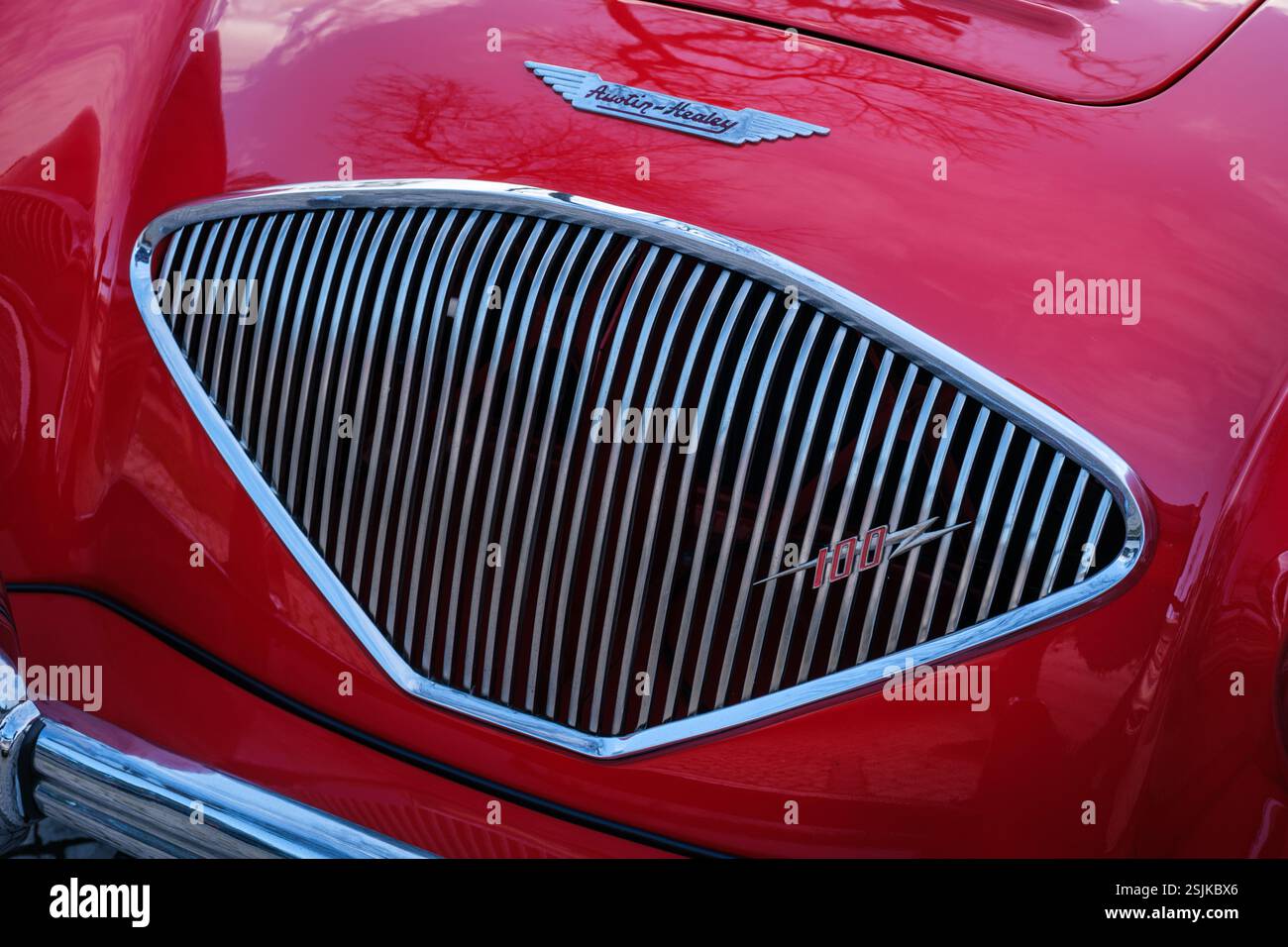 Red Austin-Healey 100 vintage convertible sports car radiator grille ...