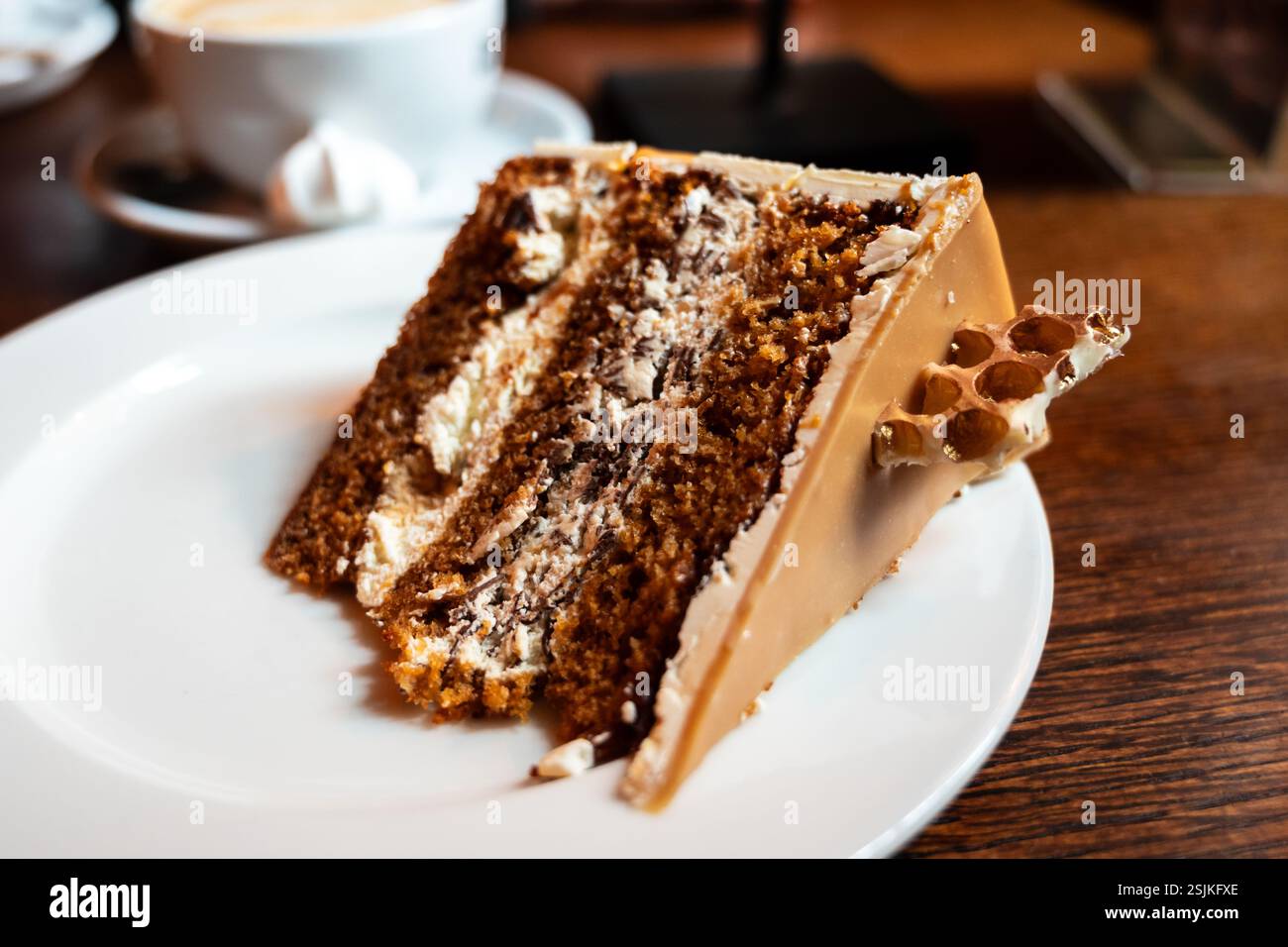 Triangular slice layered cake hi-res stock photography and images - Alamy