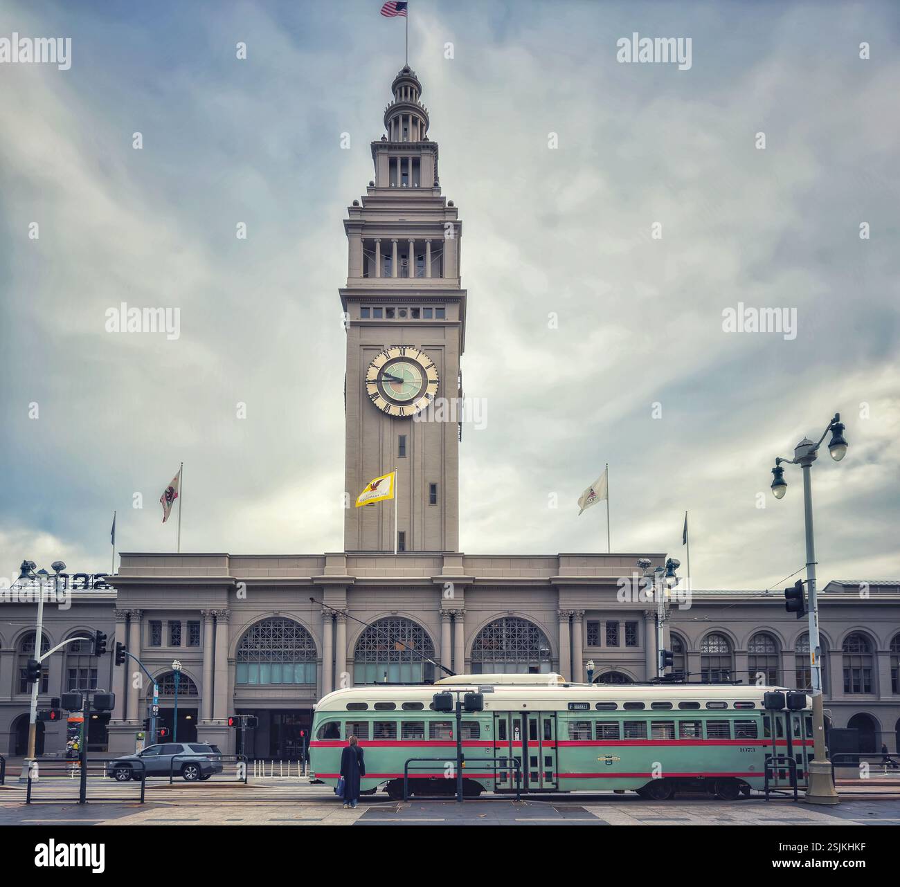 The majestic clock tower Of San Francisco Ferry Building with a tall ...