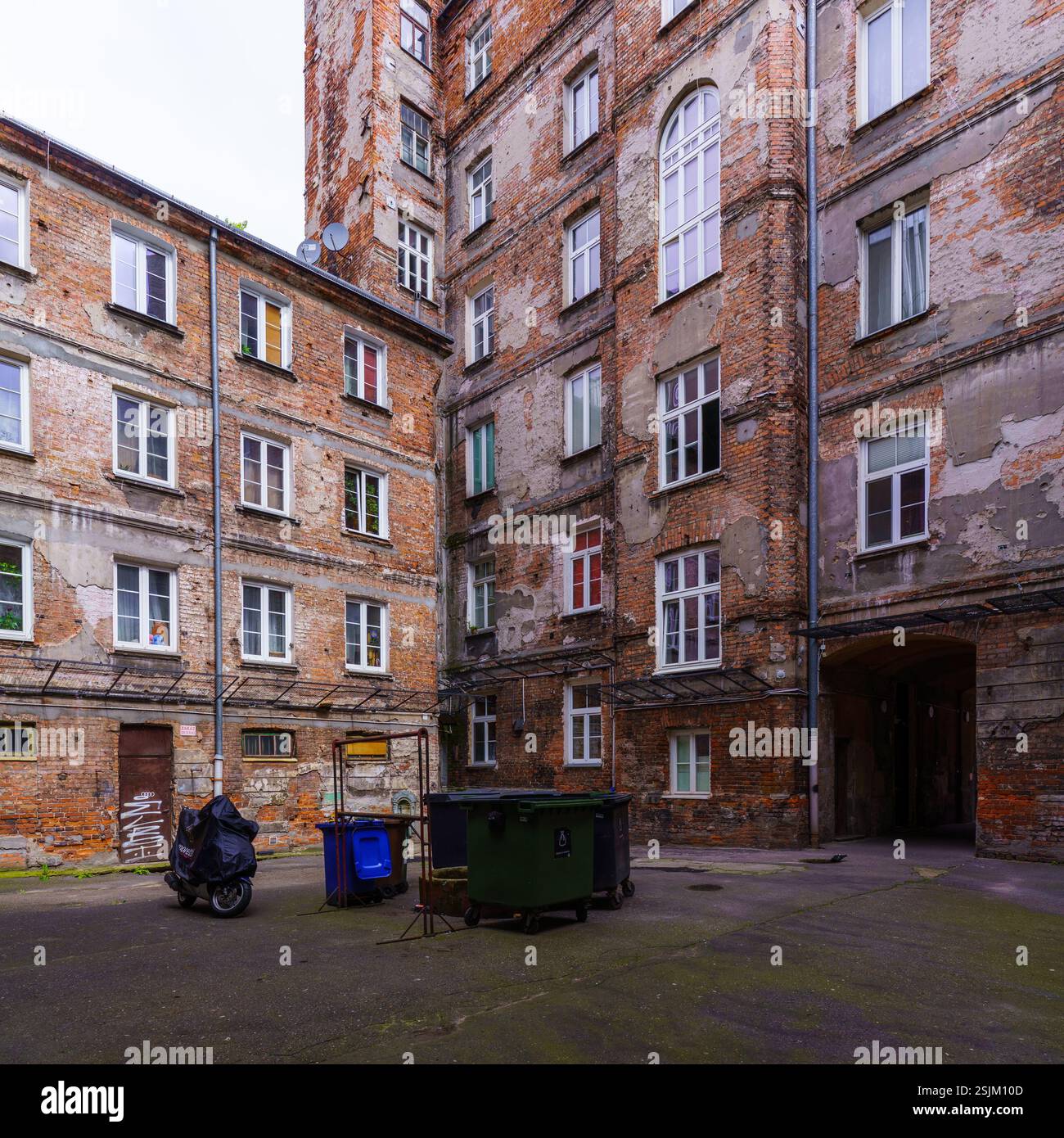 Courtyard of a dilapidated tenement house from the beginning of the ...
